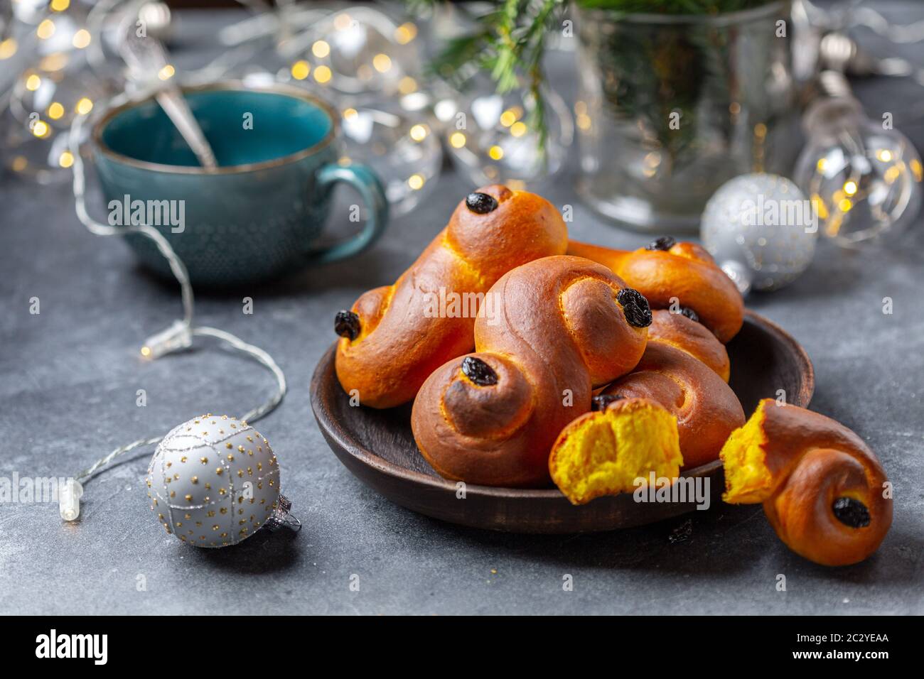Bun with saffron, a traditional Swedish lussebulle or lussekatt Stock ...