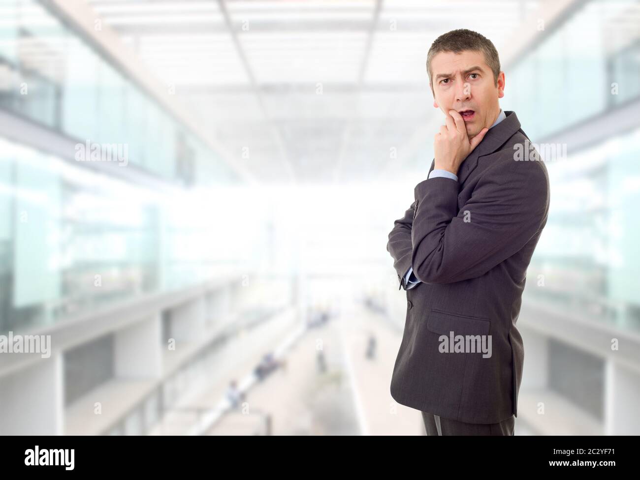 young business man surprised at the office Stock Photo - Alamy