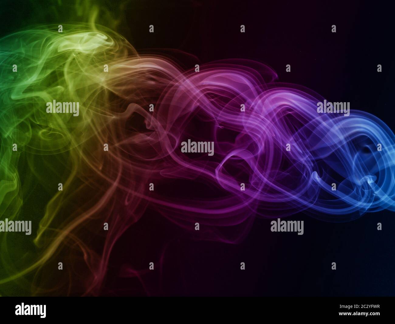 Abstract rainbow colored smoke on a black studio background Stock Photo ...