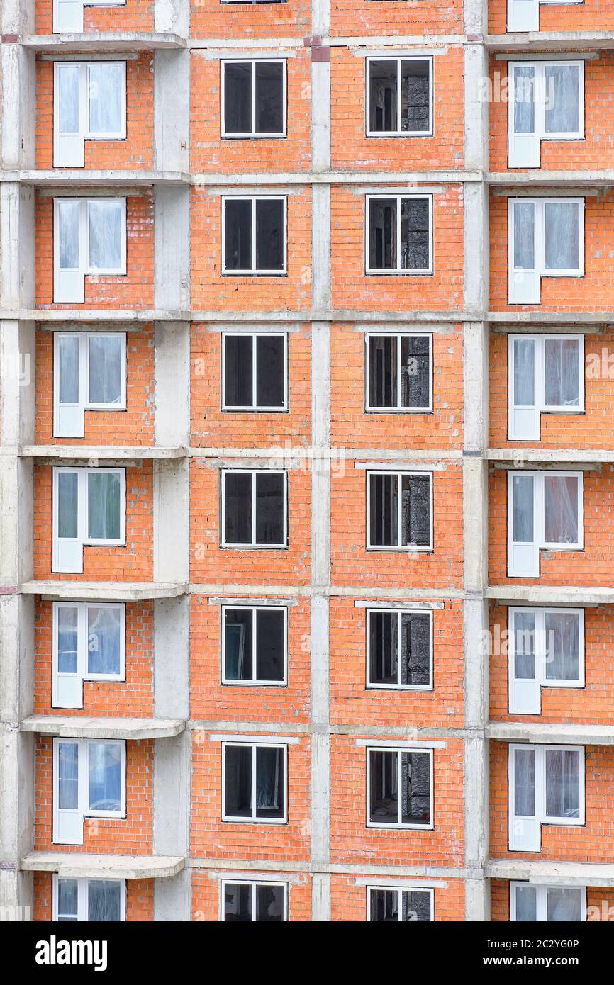 Construction of a residential building and its glazing vertically Stock ...