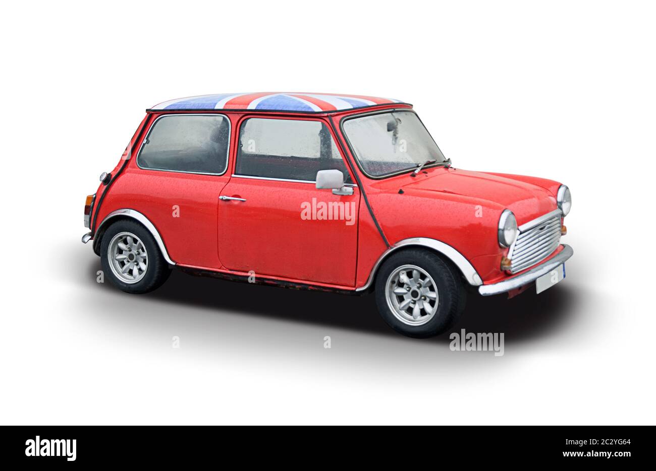 Classic British mini car side view isolated on white Stock Photo - Alamy
