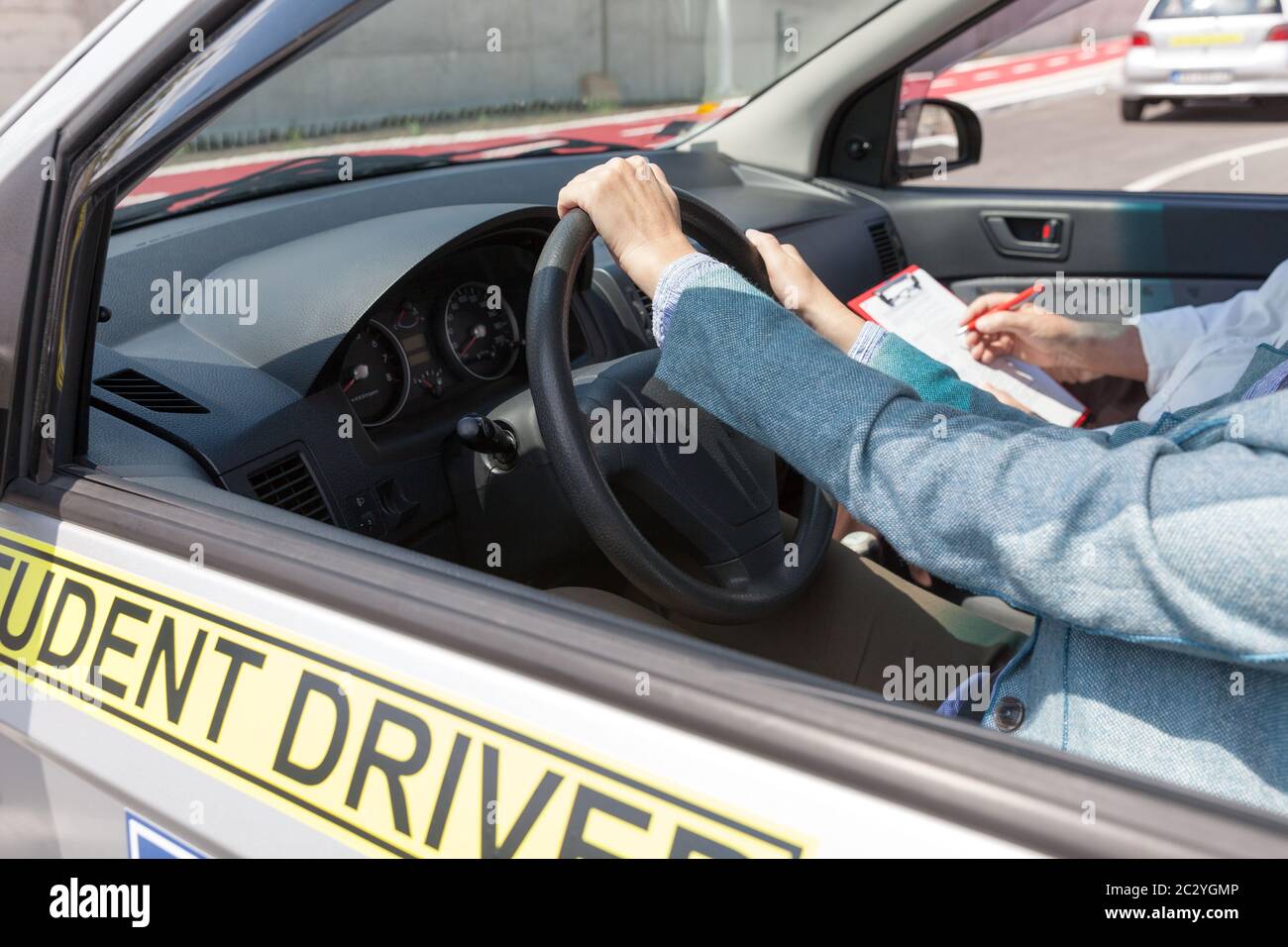 Learning to drive a car. Driving school Stock Photo - Alamy