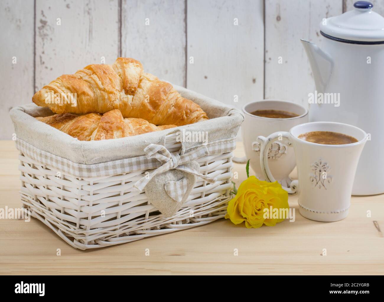 Continental breakfast table setting with tea in a cup hi-res stock ...