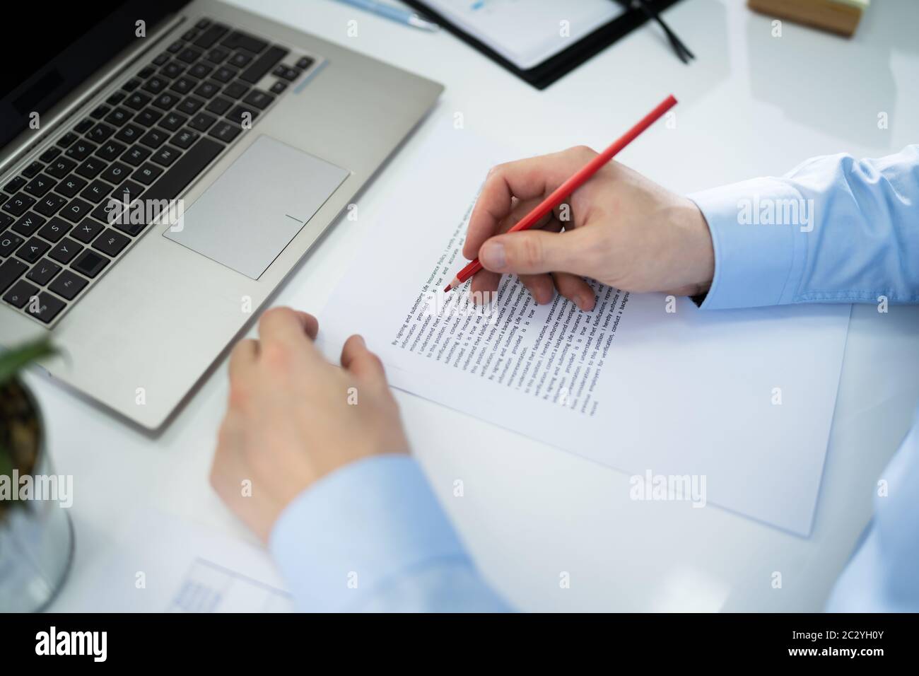 Close-up Of Red Pencil Marking Error During Spellchecking Text On Paper ...