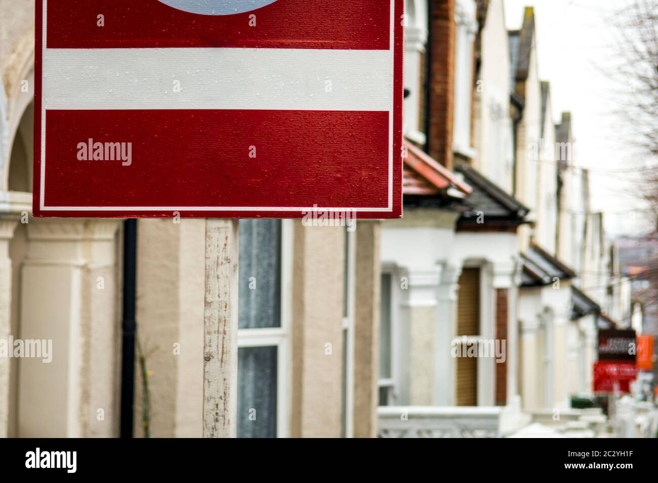 Blank estate agent sign board Stock Photo - Alamy