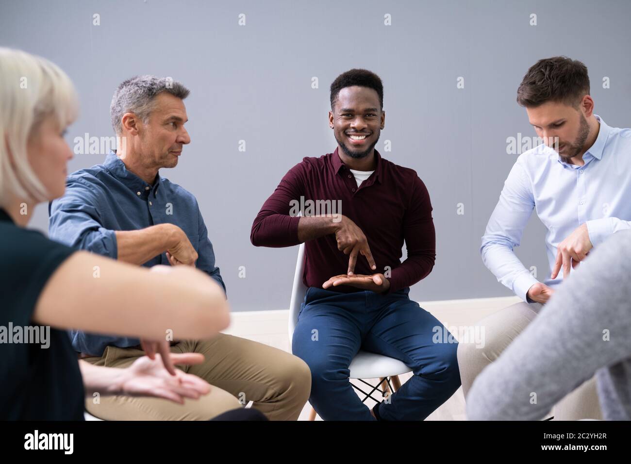 Close-up Of A Person Teaching Sign Languages To Multiethnic Pupils ...