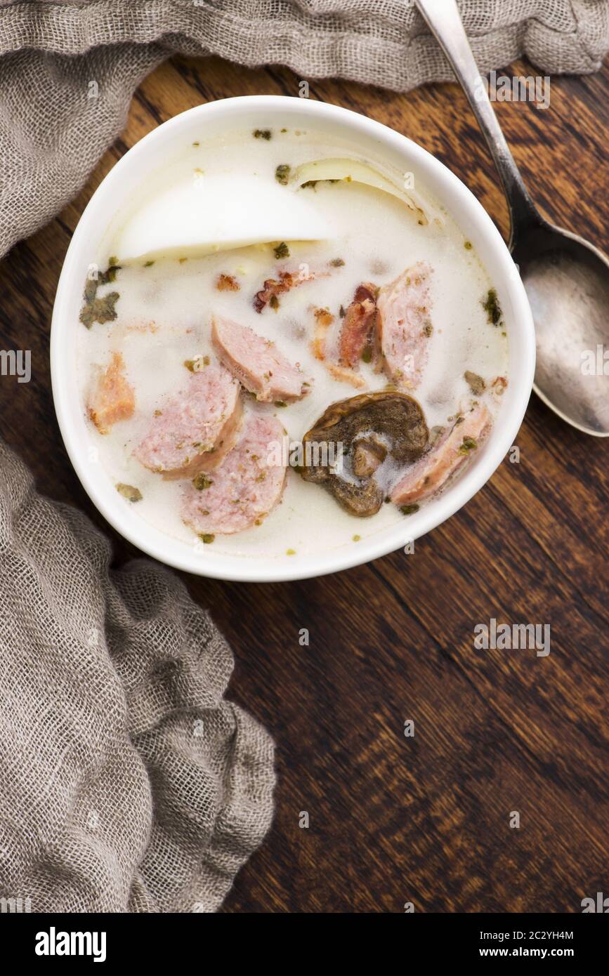 Traditional easter white borscht with eggs and sausage Stock Photo - Alamy