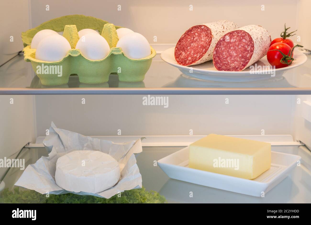 Open fridge filled with food Stock Photo - Alamy