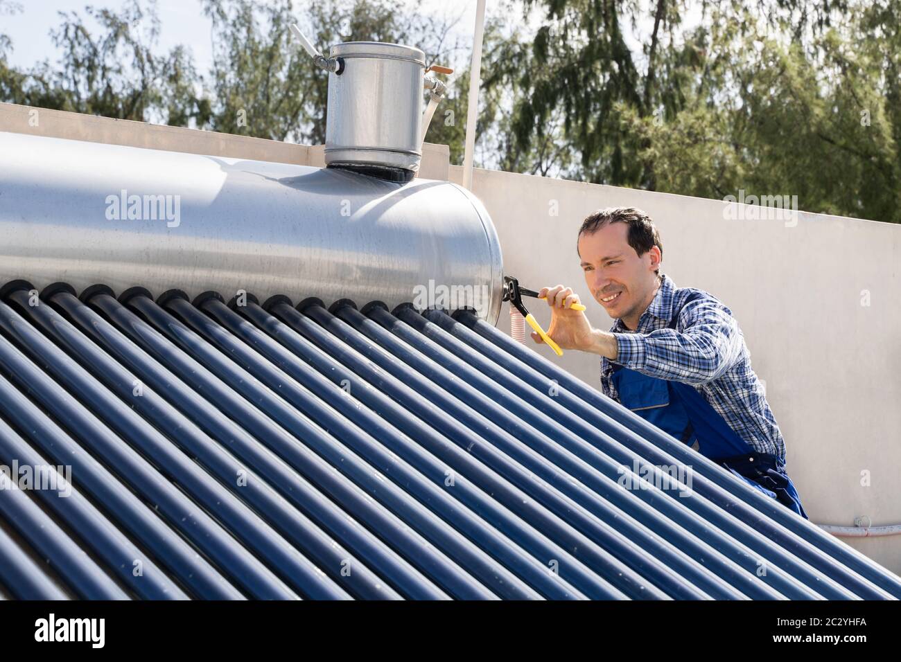Solar water heater install hi-res stock photography and images - Alamy