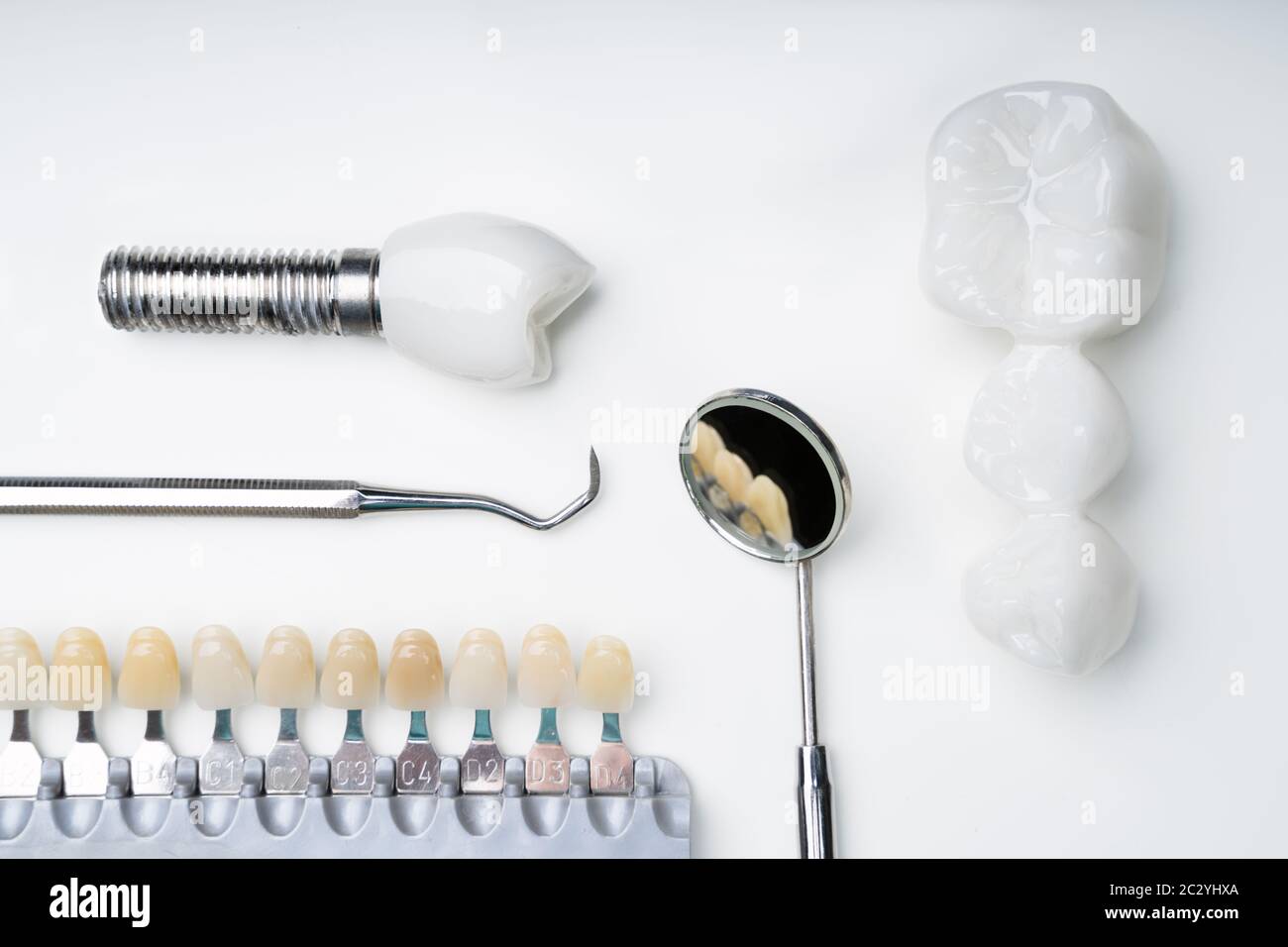 Shade Matching, Implant, Bridge And Mirror Over White Background Stock ...