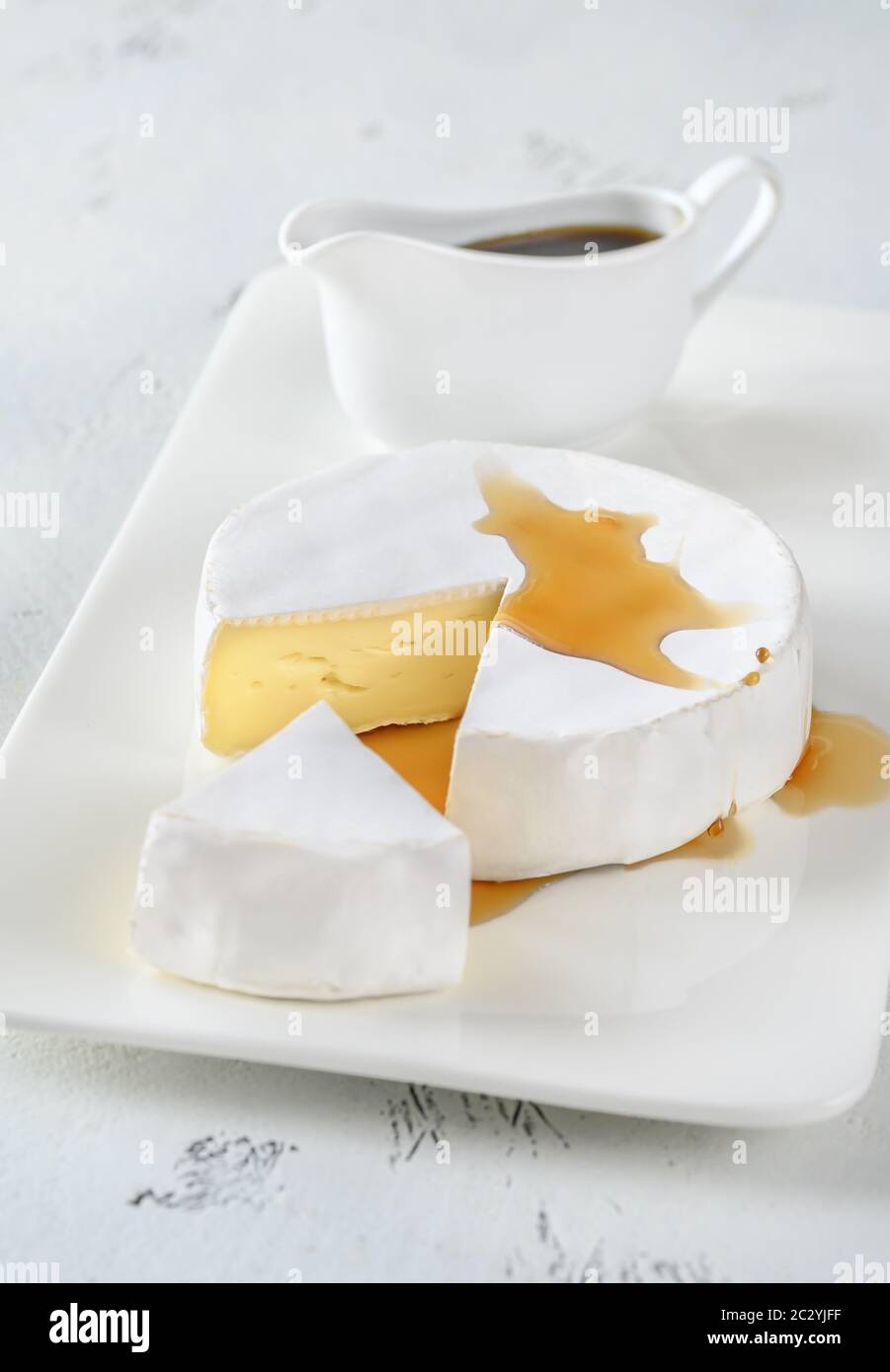 Camembert cheese head on cutting hi-res stock photography and images ...