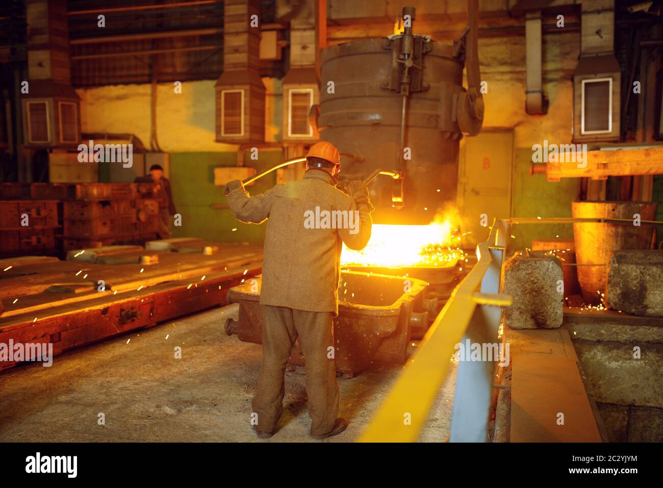 Steelmaker pours liquid metal hi-res stock photography and images - Alamy