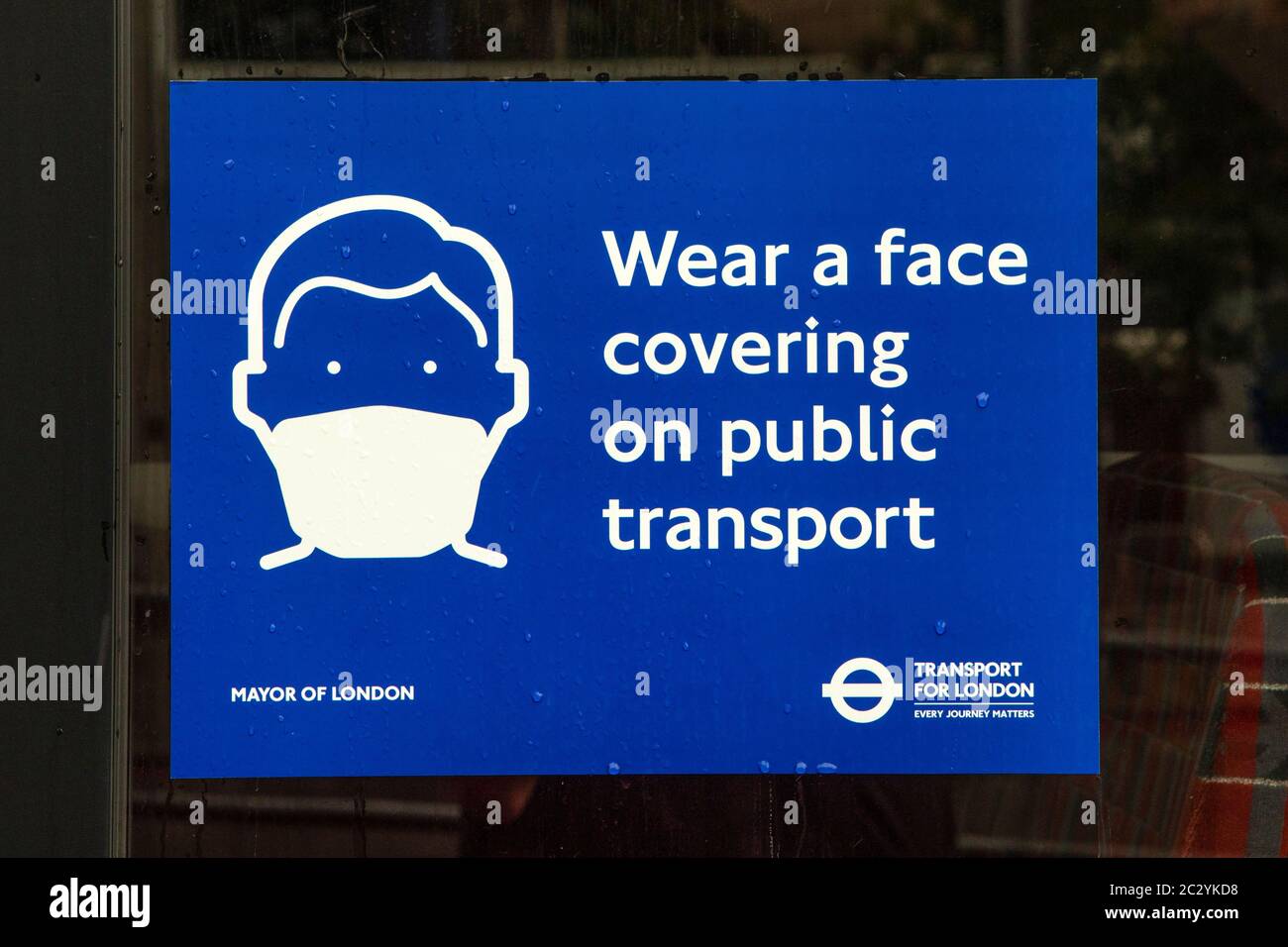 Face coverings on buses hi-res stock photography and images - Alamy