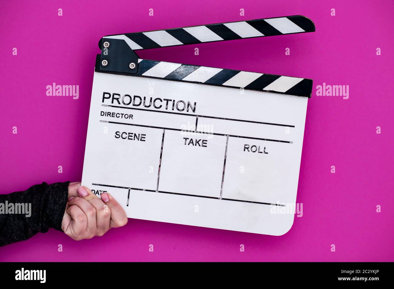 movie clapper on pink purple violet background Stock Photo - Alamy