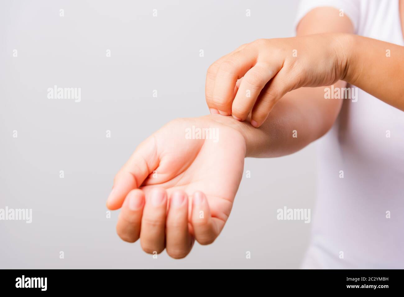 Asian beautiful woman itching her useing hand scratch itch hand on ...