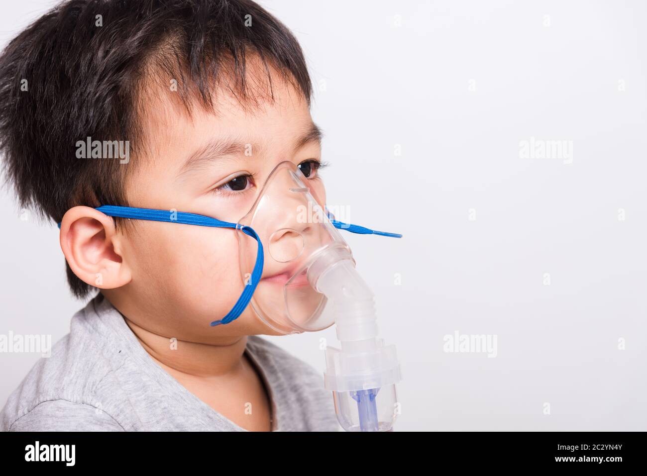 Closeup Asian face, Little children boy sick he using steam inhaler ...