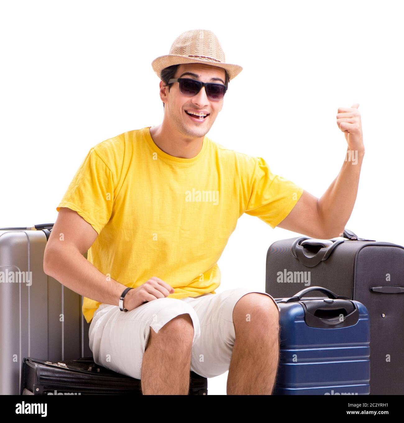 The happy young man going on summer vacation isolated on white Stock ...