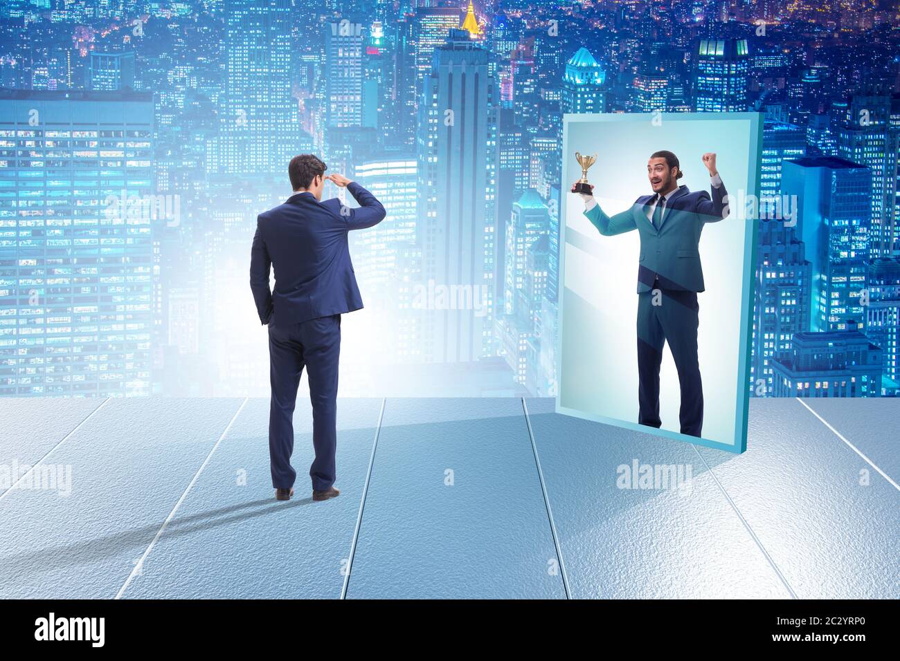 Man dreaming of bigger success Stock Photo - Alamy
