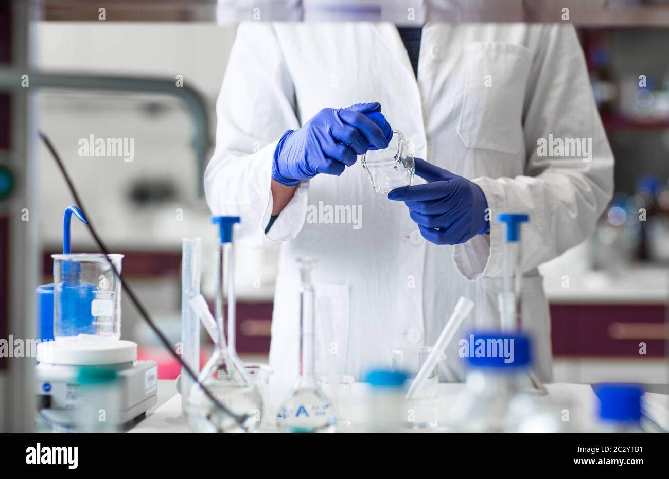 Researcher carrying out scientific research in a lab (shallow DOF ...