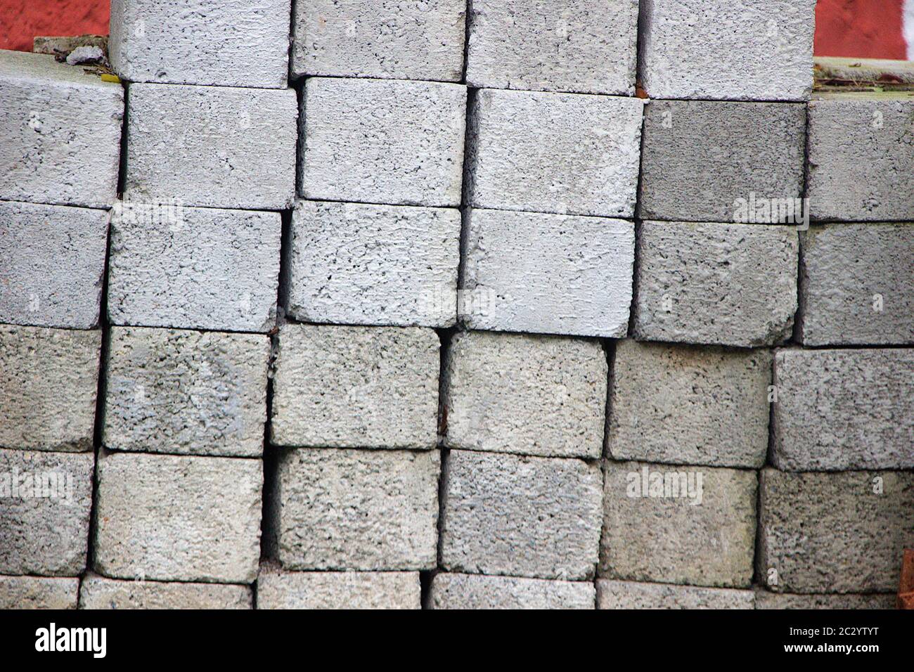 Frontal view of stack of concrete blocks piled up vertically Stock ...