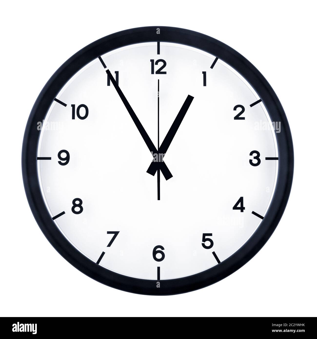 Classic analog clock pointing at twelve fifty five, isolated on white ...
