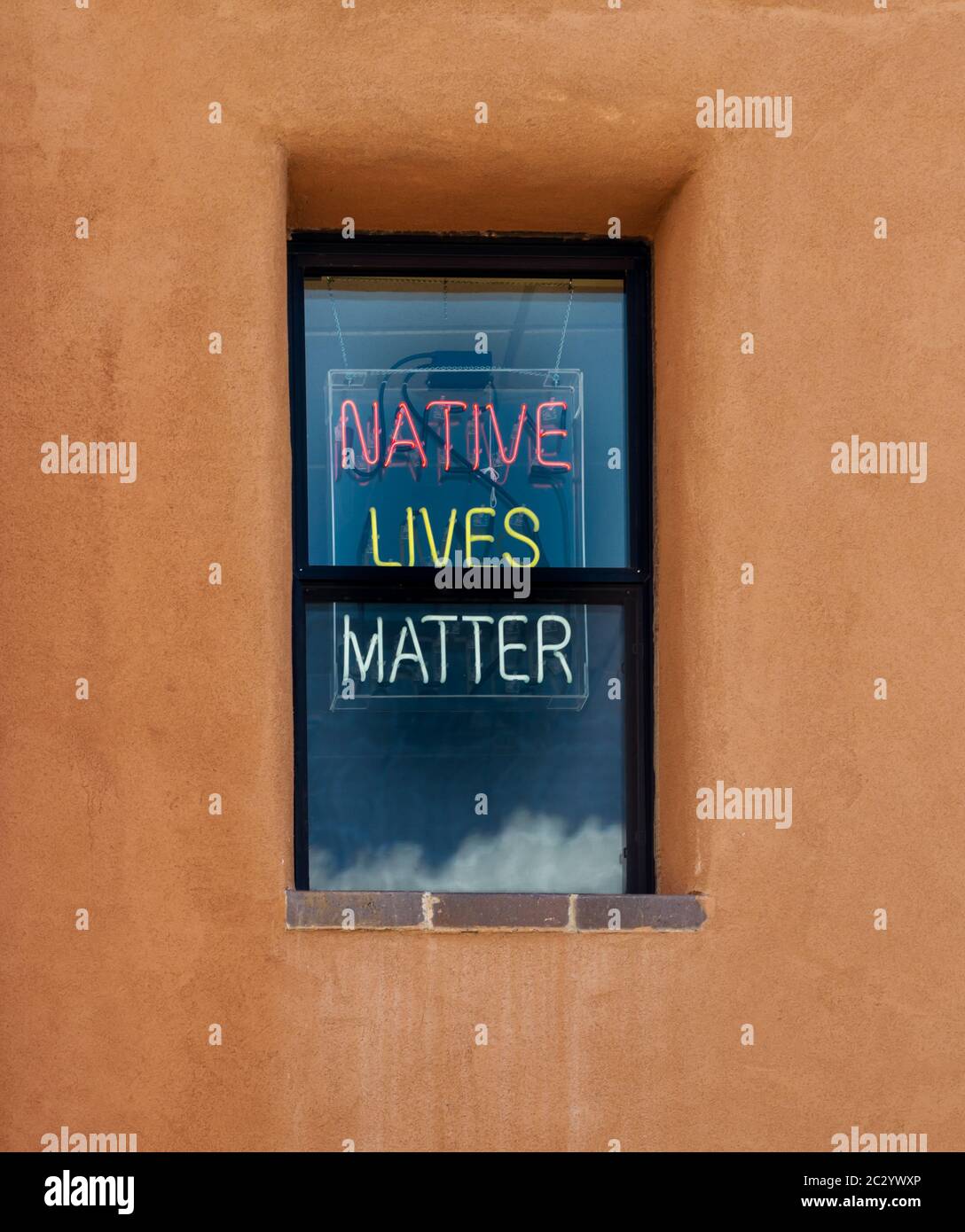 Protest sign, Native Lives Matter, protesting the reenactment of the ...