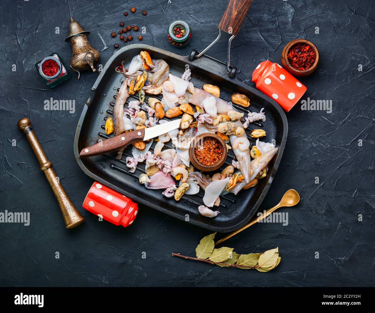 Raw seafood with fresh mussels,clams,squid, shrimps and spice Stock ...