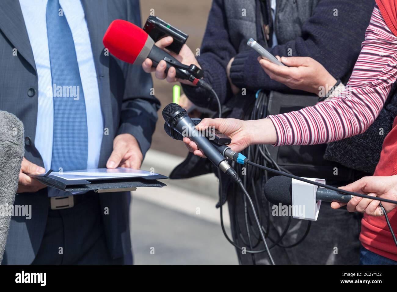 Media interview. Broadcast journalism. Microphone Stock Photo - Alamy