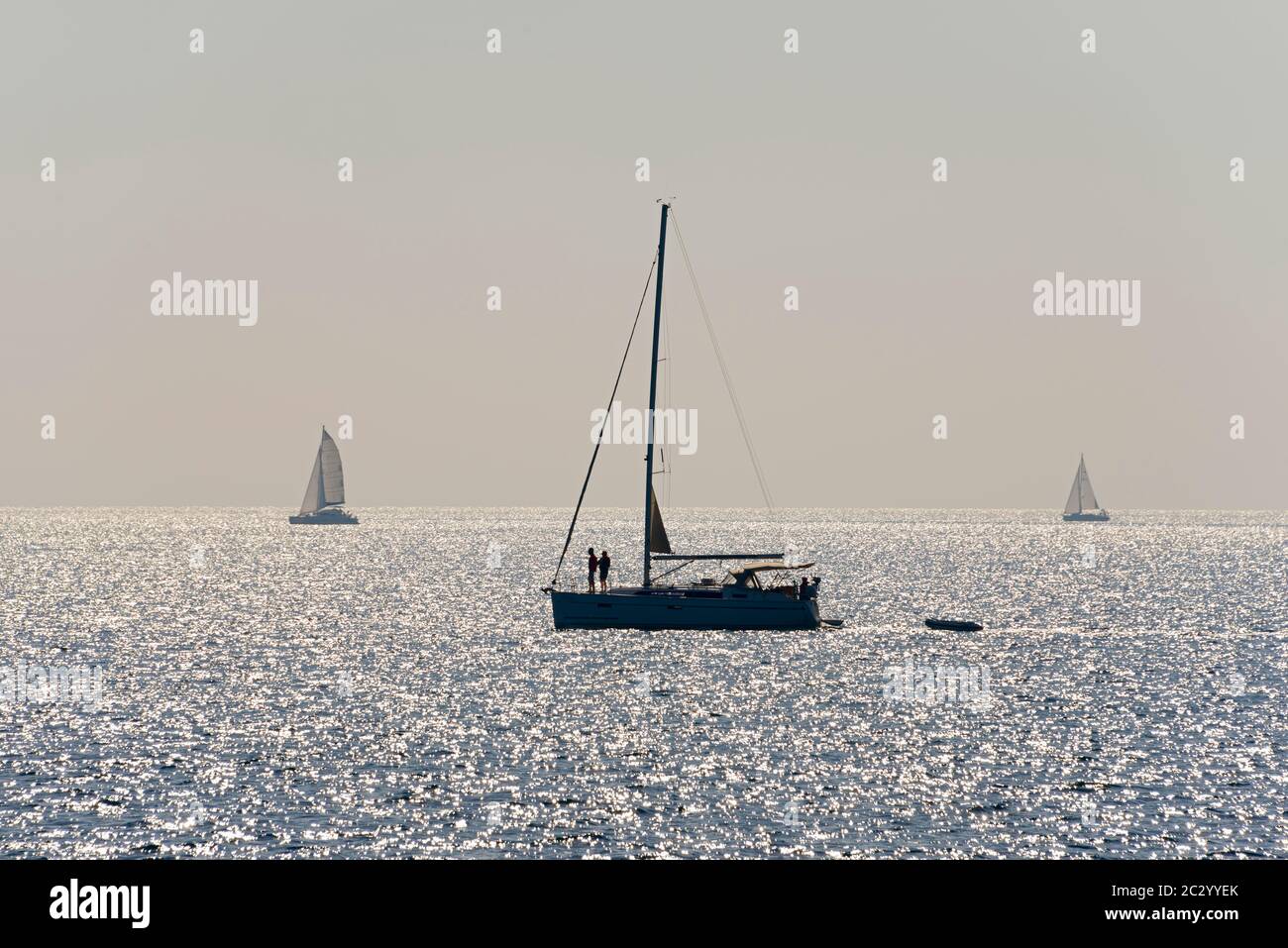 Sailing ship, back light, reflections, Dalmatia, Croatia Stock Photo ...