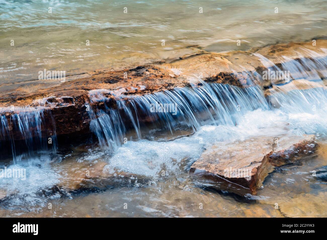Landscape with view of small waterfall in stream, Banff National Park ...