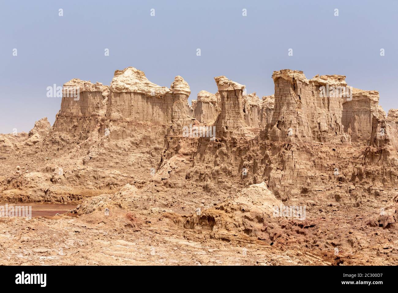 High rock formations rise in the Danakil depression like stone rock ...