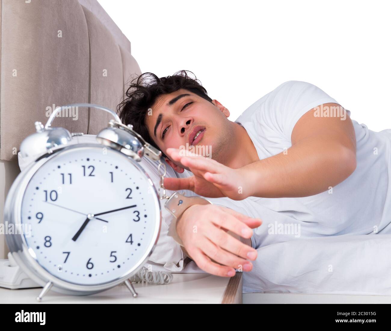 Man in bed suffering from insomnia Stock Photo - Alamy