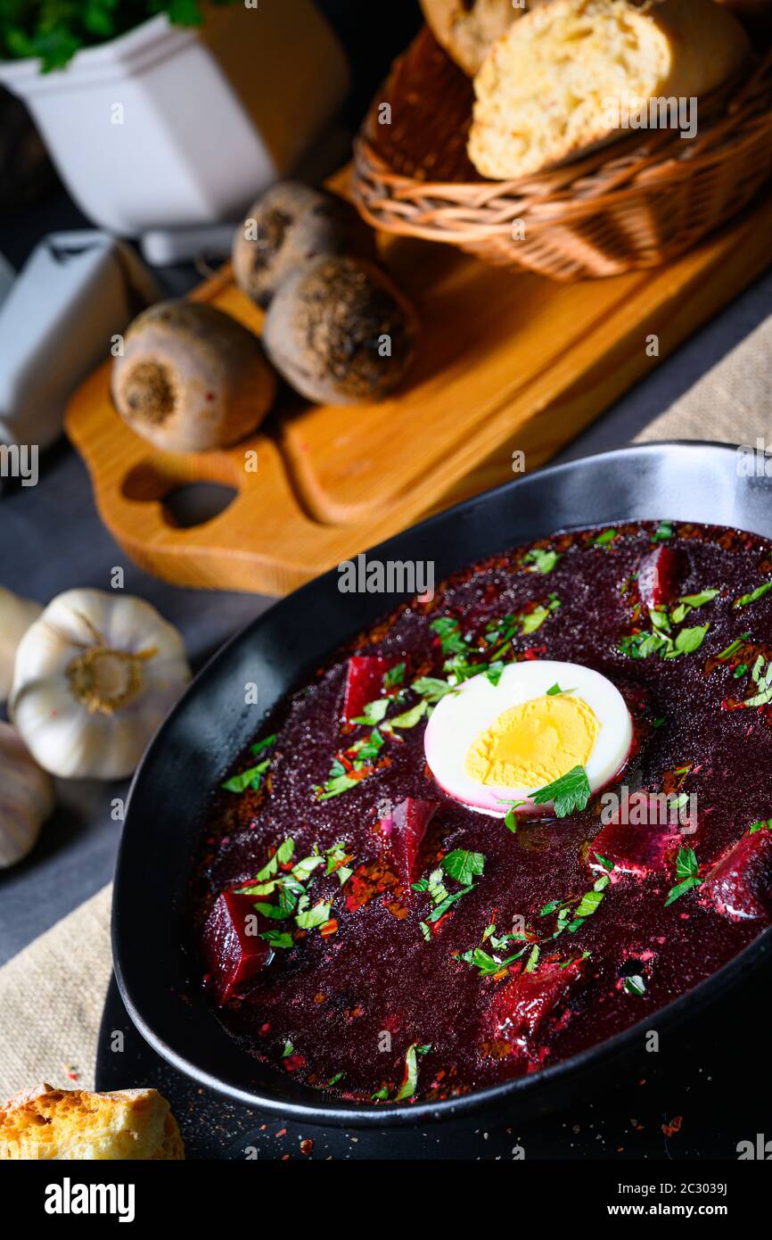 Delicious beetroot borscht with egg Stock Photo - Alamy