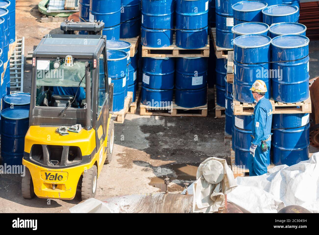 Handling of barrels with catayst by staff of Mourik Ltd, The ...