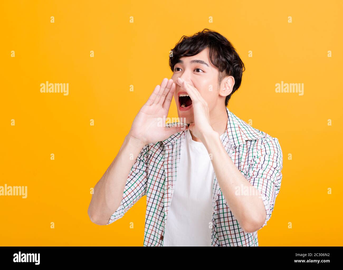 side view of excited young man screaming loudly Stock Photo - Alamy