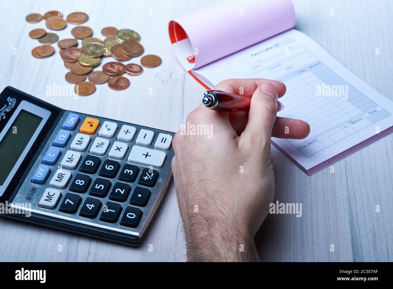 Close up of man counting money and making notes Stock Photo - Alamy