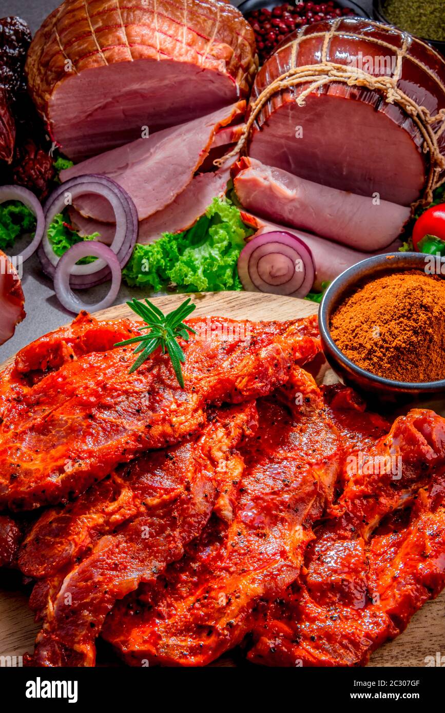 Composition with assorted meat products including ham, sausage and ...