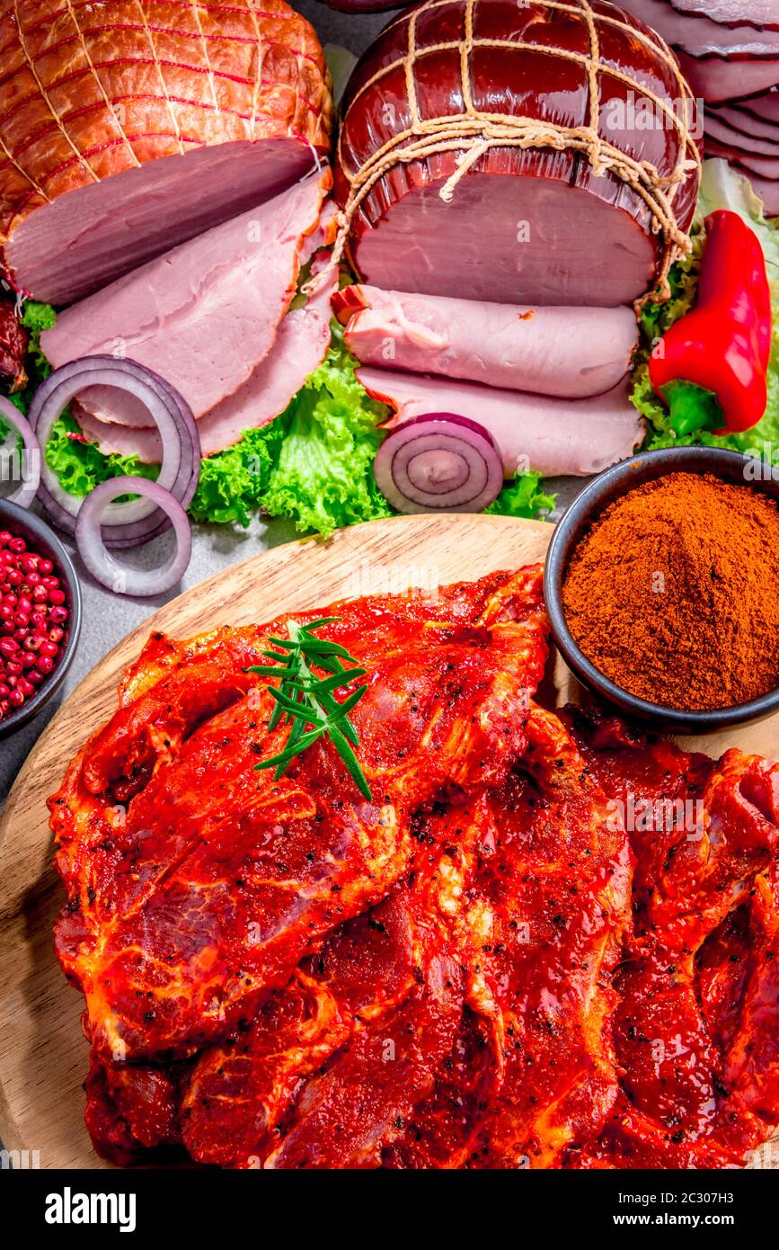 Composition with assorted meat products including ham, sausage and ...