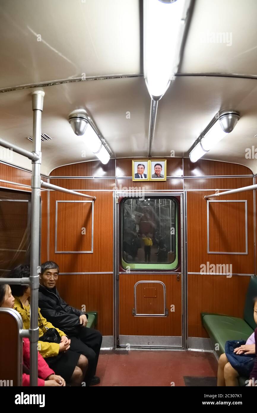 Pyongyang, North-Korea - May 1, 2019: Passengers in the retro subway ...