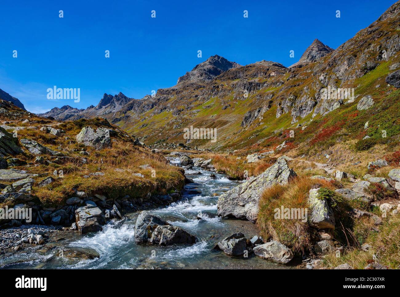 Hiking trail into the Klostertal along the Klostertaler Bach, Silvretta ...