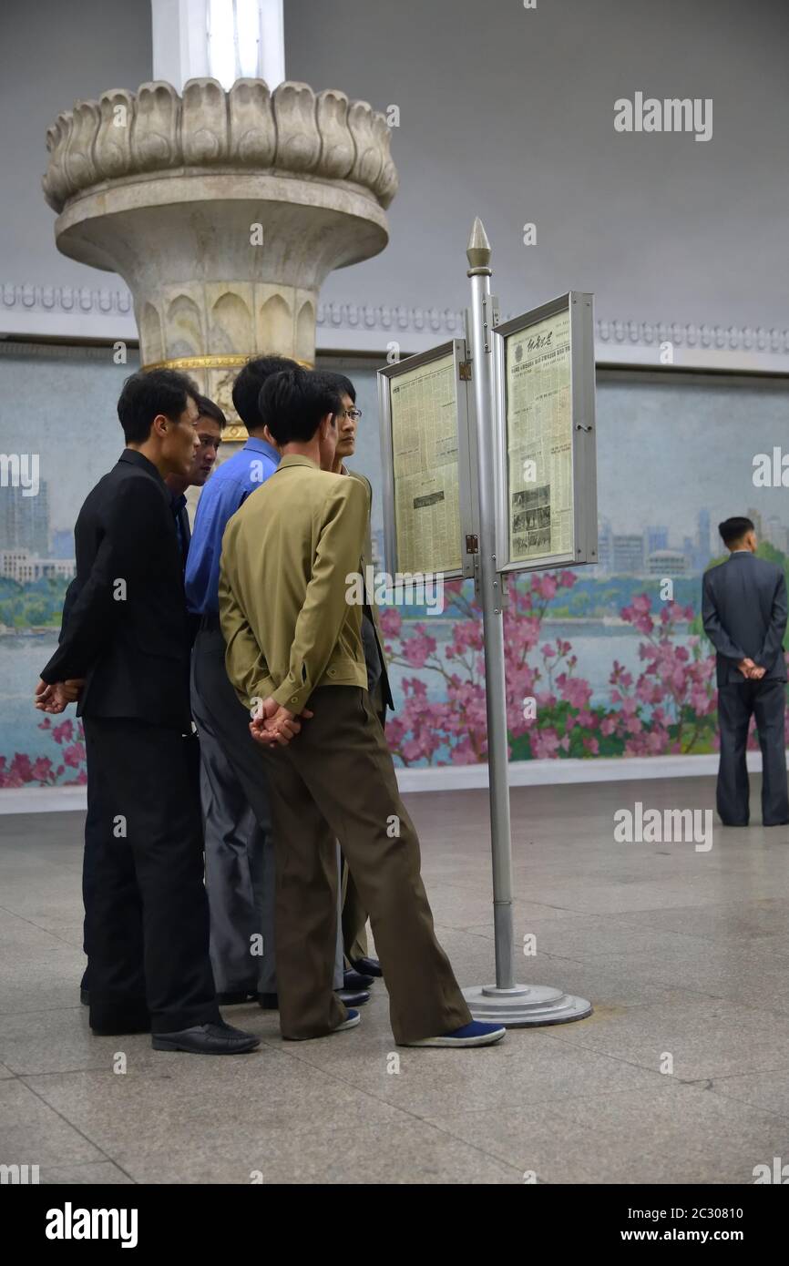 Pyongyang, North-Korea - May 1, 2019: Men at the Yonggwang subway ...