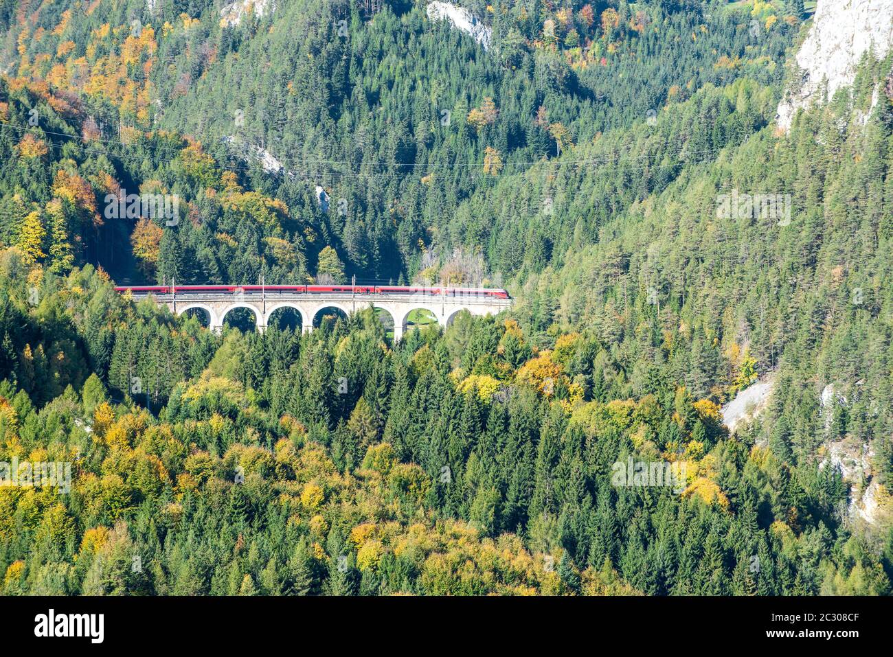Viaduct and tunnel on the Semmering Railway. The Semmering Railway is ...