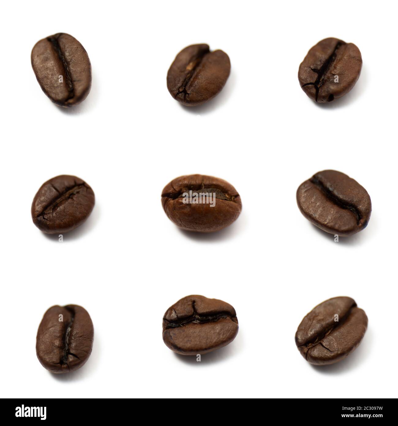Variations of nine coffee beans, isolated macrophoto Stock Photo - Alamy