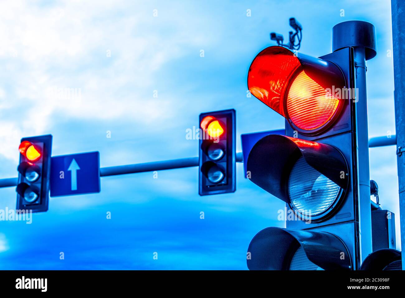 Traffic lights over urban intersection Stock Photo - Alamy