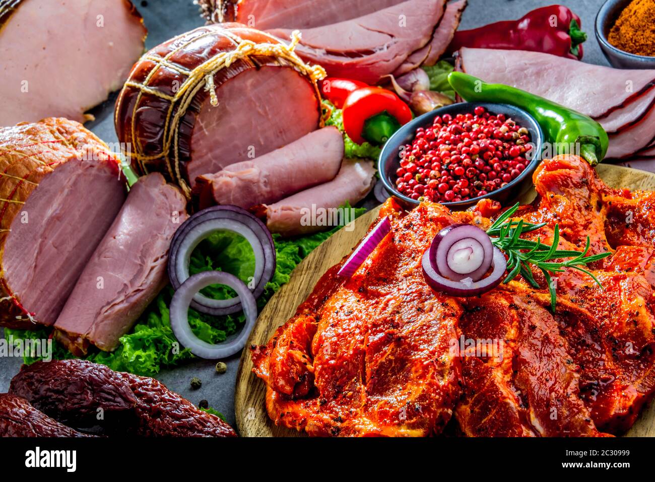 Composition with assorted meat products including ham, sausage and ...