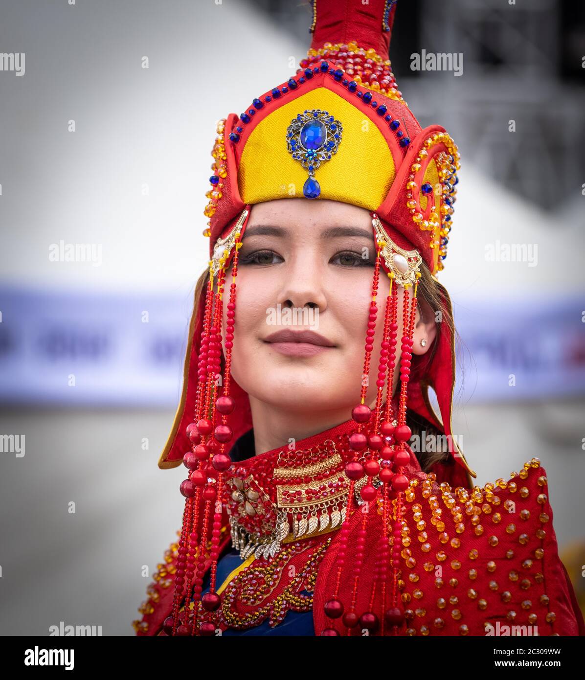 Mongolian young female posing in the national costume, Ulaanbaatar city ...