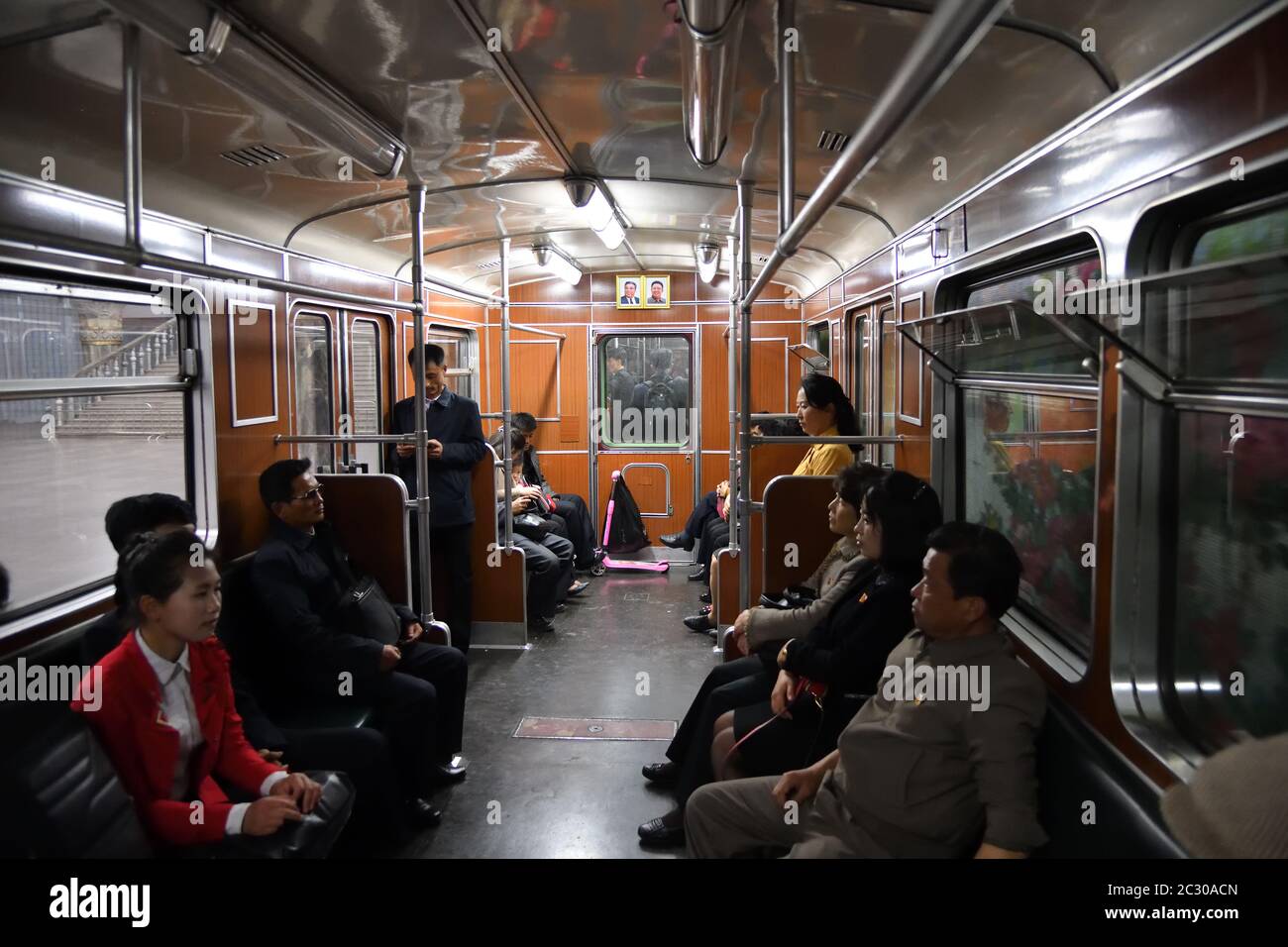 Pyongyang, North-Korea - May 1, 2019: Passengers in the retro subway ...