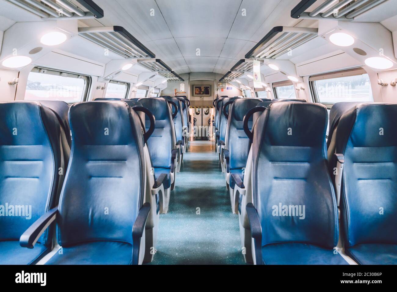 Interior of railway passenger car of the second class in train in ...