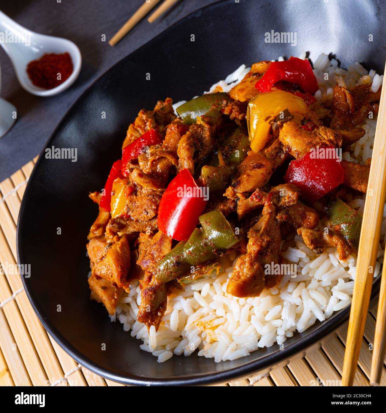Hot roasted chicken with rice and vegetables Stock Photo - Alamy