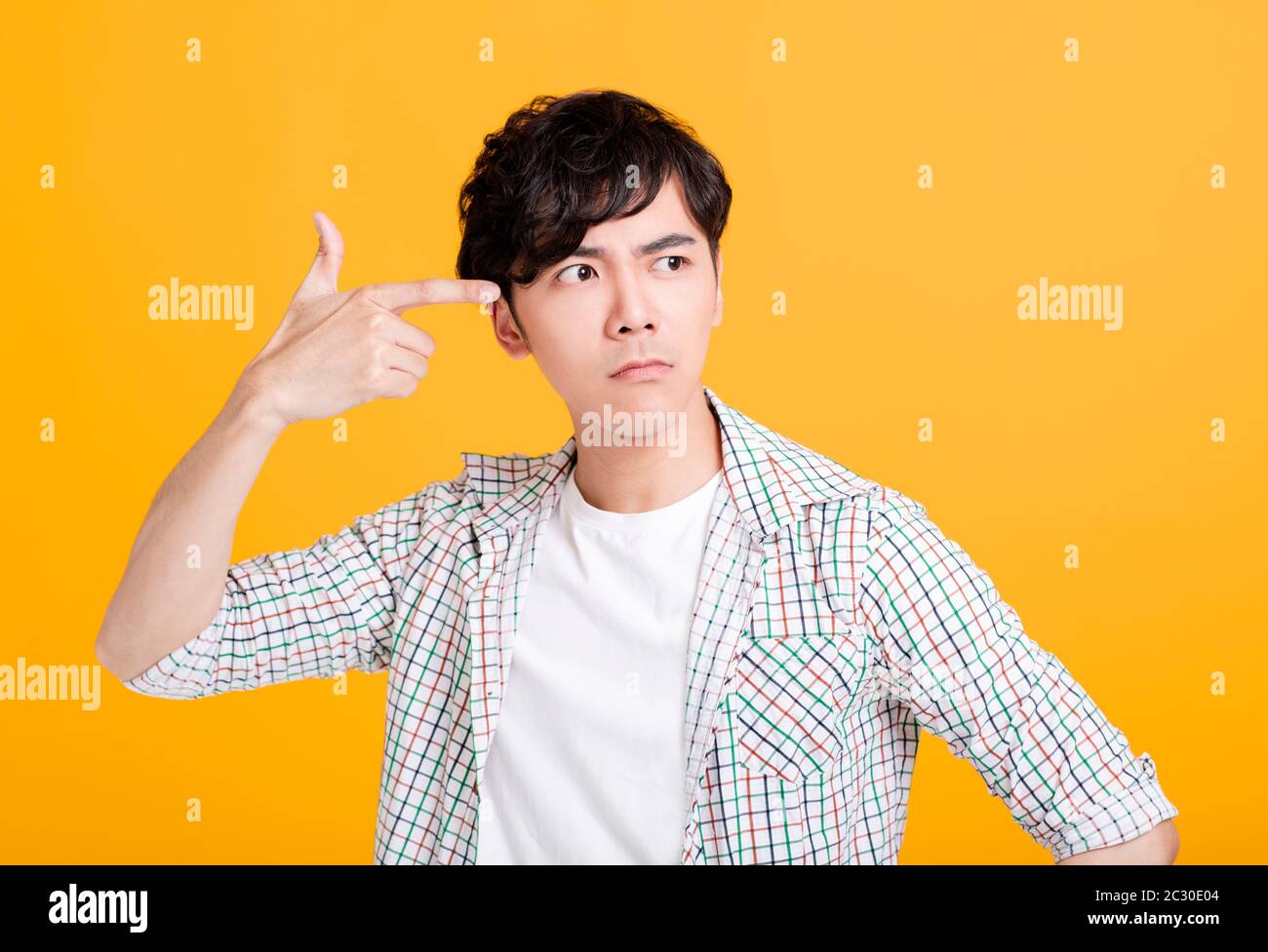 Man pointing finger gun gesture hi-res stock photography and images - Alamy